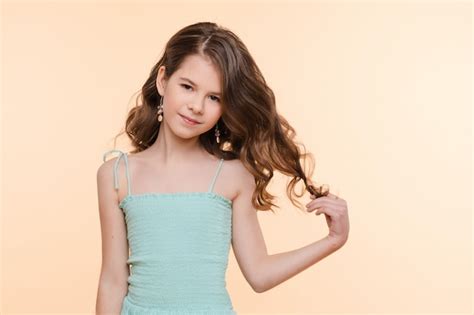 Premium Photo Pre Teen Girl With Beautiful Hair In Blue Dress