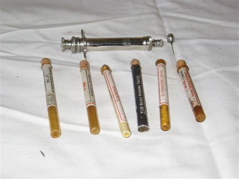 Hypodermic Tablets And Needle Six Containers Of Hypodermic T… Flickr