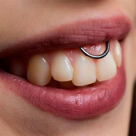 Smiley Piercing Guide To Get A Mouth Piercing Glaminati