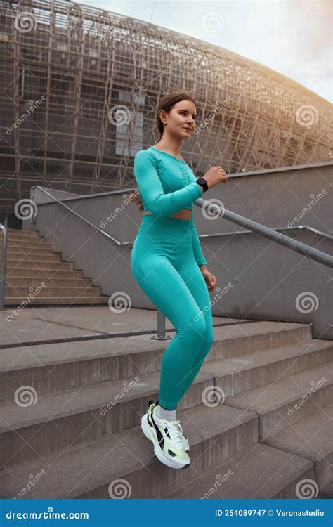 Side View Shot Of Fitness Woman Running On Steps Female Runner Athlete