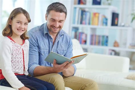I Love Story Time With Dad A Father Reading A Story To His Daughter At