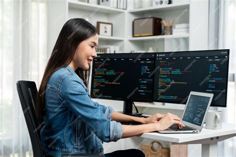 Premium Photo Smiling Asian It Typing Online Software Development On Laptop Stratagem