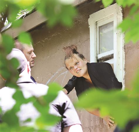Woman Stuck In Window Rescued By Alton Firefighters