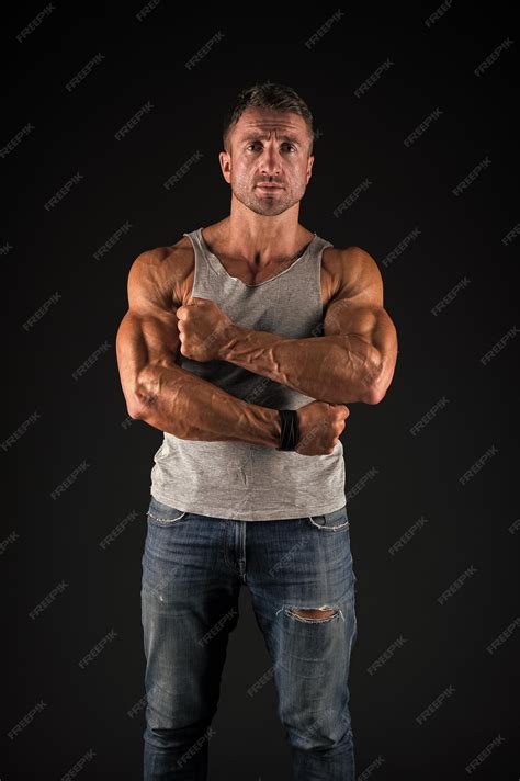 Premium Photo Athletic Man Cross Strong Muscular Arms With Biceps