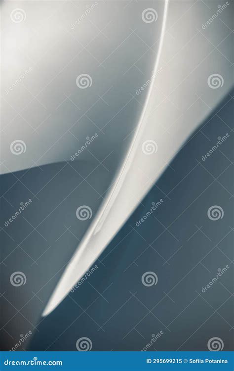 Blue And Gray Abstract Background From Curved Lines Of Geometric Shapes