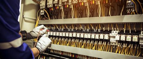 Engineer Using Measuring Equipment Tool Checking Electric Current Voltage At Stock Image Image