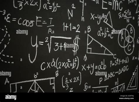 Blackboard Inscribed With Scientific Formulas And Calculations In Physics Mathematics And
