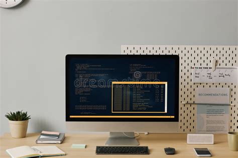 Front View Computer With Code Lines On Screen In Minimal Home Office Setup Stock Image Image
