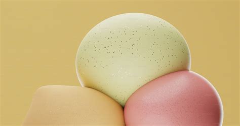 노란색 배경에 다른 색깔의 계란의 무리 사진 Unsplash의 화려한 이미지