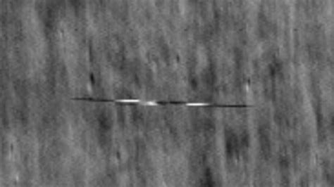 Surf Board Shaped Ufo Filmed Speeding Around The Moon By Nasas Lunar Orbiter Daily Mail Online