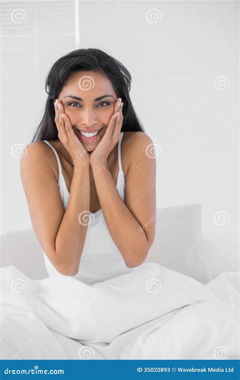 Gleeful Dark Haired Woman Posing Smiling At Camera Stock Image Image Of Cushion Hair 35020893