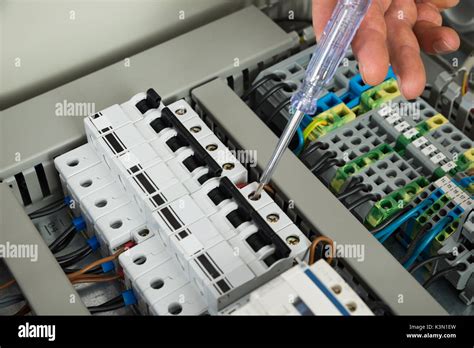 Man Testing Fuse Box Hi Res Stock Photography And Images Alamy
