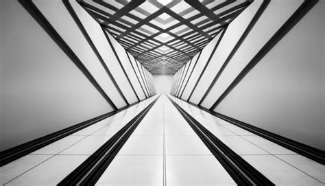 Premium Ai Image Futuristic Architecture Steel Glass And Geometric Shapes Create Abstract