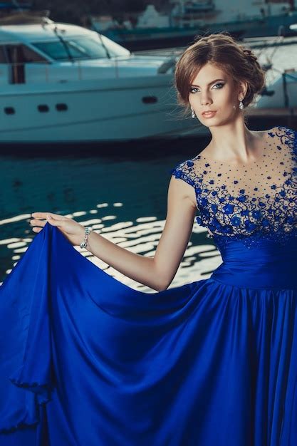 Premium Photo Beautiful Young Perfect Girl In A Dress And Makeup