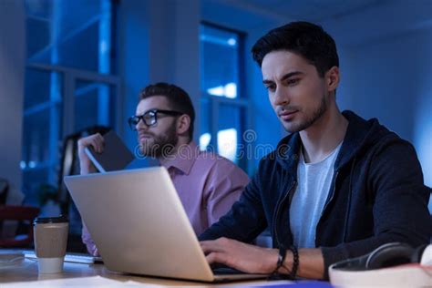 Attractive Bearded Programmer Typing On The Laptop Stock Image Image