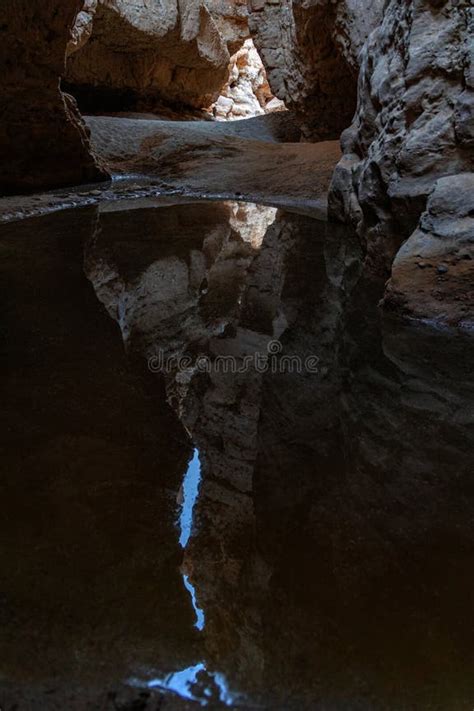 A Water Pond With Reflection In The Narrow Passage Of Sesreim Gorge