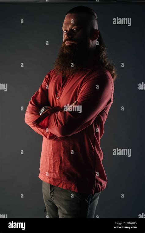 Beautiful Strong Nordic Man With Stylish Hairstyle And Beard On A