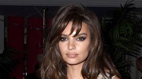 Emily Ratajkowski Shows Off Incredible Figure In Ripped Fur Bikini As