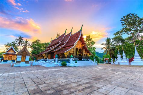 Luang Prabangs Iconic Wat Xieng Thong Golden City Temple In The Sunset Is Even More Splendid