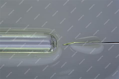 Premium Photo Ovum With A Needle For Artificial Insemination Or In