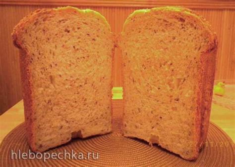 Пшеничный хлеб с семенами льна, кунжута и подсолнечника в хлебопечке ...