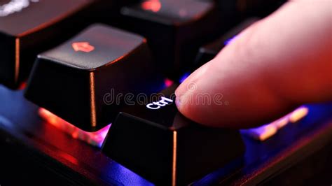 Human Finger Clicks On The Control Key On The Computer Keyboard Close Up View Man Finger