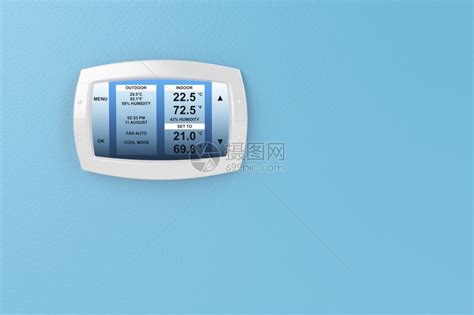 蓝色墙上的数字自动调温器高清图片下载 正版图片303296787 摄图网
