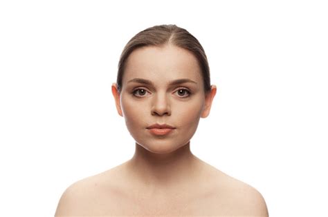 One Young Beautiful Woman With Perfect No Makeup Face Looking At Camera