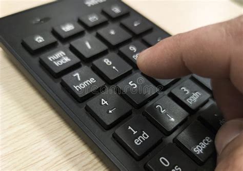 Mature Mans Hand Pressing A Numeric Keypad Stock Photo Image Of Entering Numeric