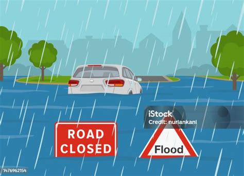 ถนนที่ถูกน้ําท่วมและสภาพอากาศที่ฝนตก รถเอสยูวีและสัญญาณเตือนที่จมอยู่ใต้น้ําบางส่วน ภาพประกอบ