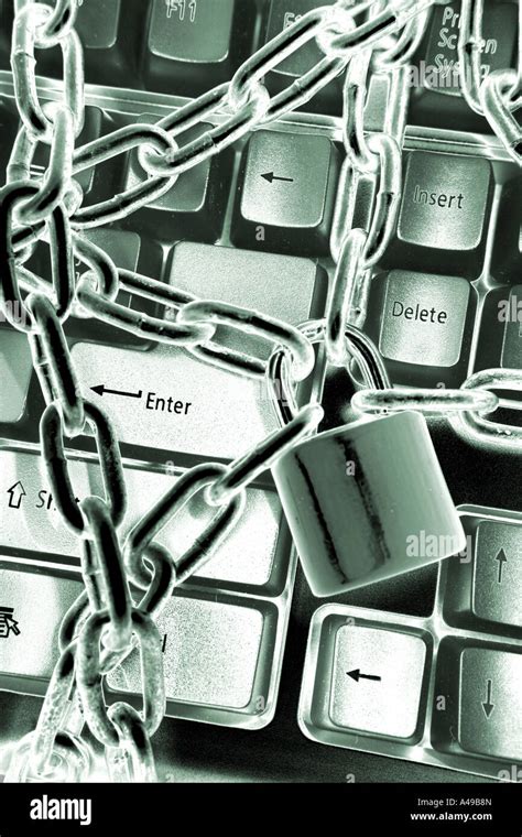 Padlock And Chain Around Computer Keyboard Stock Photo Alamy