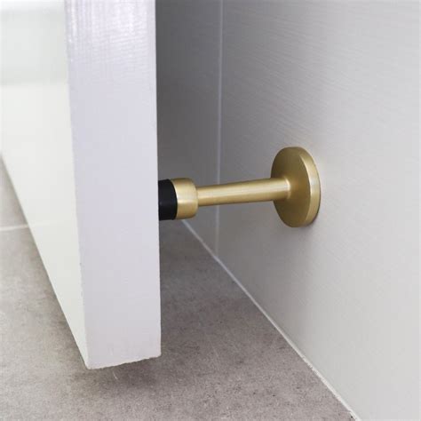 Adoored Brushed Brass Arrow Door Stop Bunnings Australia
