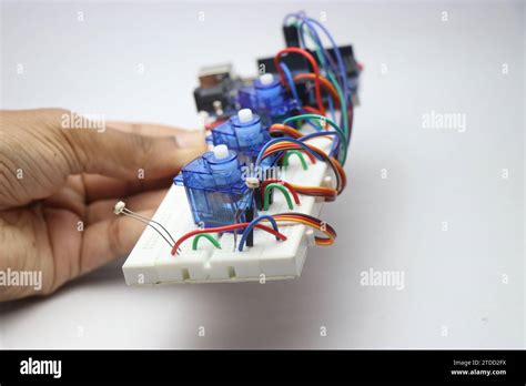 Breadboard With Wires And Micro Servos Connected To An Electronic Chip Stock Photo Alamy