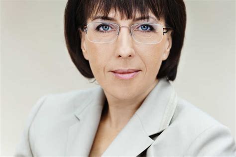 戴着眼镜的中年妇女图片 穿着西装戴着眼镜的中年妇女素材 高清图片 摄影照片 寻图免费打包下载