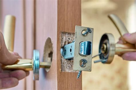 Premium Photo Fixing Faulty Lever Doorhandle With Latch On An