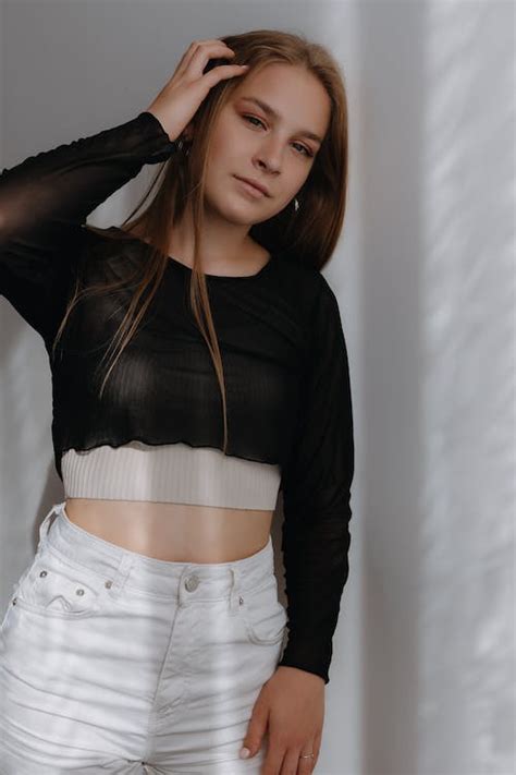 Redhead Model Wearing Silicone Nipple Covers To See Through Turtleneck