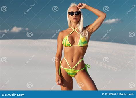 Beautiful Woman In Bikini Enjoying Summer Sun And Tanning During Holidays At The Beach Sexy