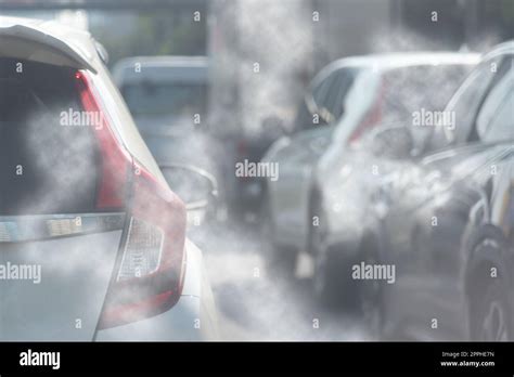 Air Pollution From Car Exhaust Smoke Traffic In The City Reducing