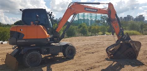 두산 03w 타이어굴삭기 Dx55w 5k 2020년 2000시간 코끼리 집게 회전라인 매매 전문가들