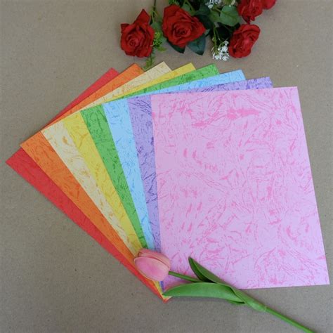 กระดาษหนังช้าง กระดาษทำปก ปกรายงานสีสดใส ราคาถูก บรรจุ 10 แผ่น 150แกรม Shopee Thailand