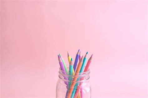 Download Pretty Pastel Colored Pencils In Jar Wallpaper