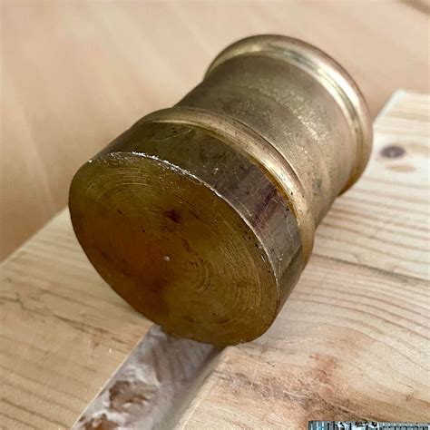 Circular Made Of Solid Brass And With Knurling Around Some Of The Side