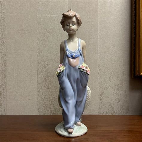 Фарфорова статуетка Lladro «кишені повні бажань — ціна 6000 грн у каталозі Статуетки Купити