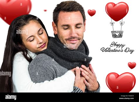 Composite Image Of Smiling Couple Hugging Eyes Closed Stock Photo Alamy