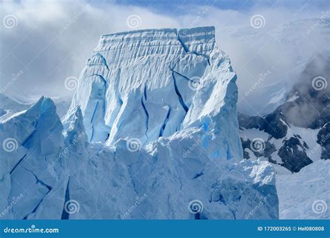 Huge Glacier Wall Towering In Antarctica Majestic Blue And White Ice