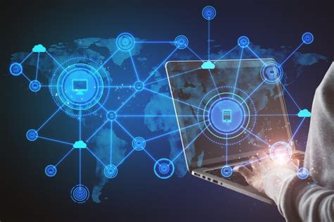 Premium Photo Hand Using Laptop With Abstract Computer Map And Digital Icons Hologram On Blue