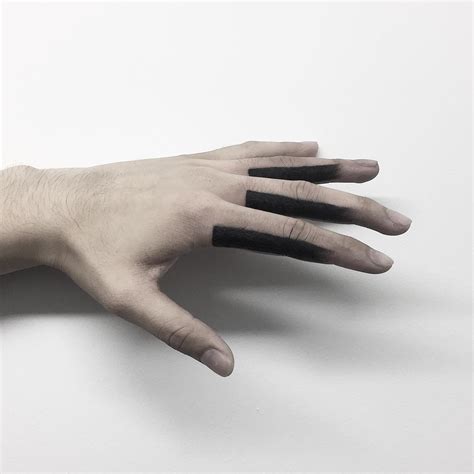 Dark Finger Tattoos
