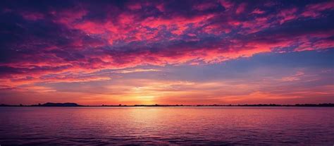 Premium Photo Beautiful Orange Sunset On The Shore Of The Beach