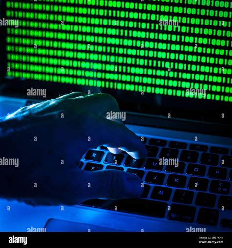Hand Typing On Laptop Keyboard Green Numbers On Display Hacker Forcing The System Programmer