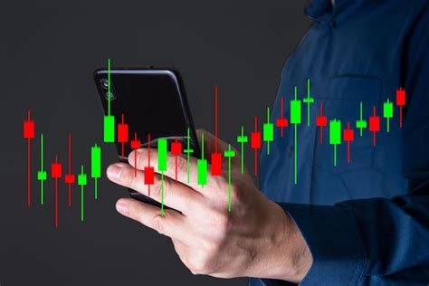Premium Photo The Hand Of A Businessman Or Trader Shows A Growing